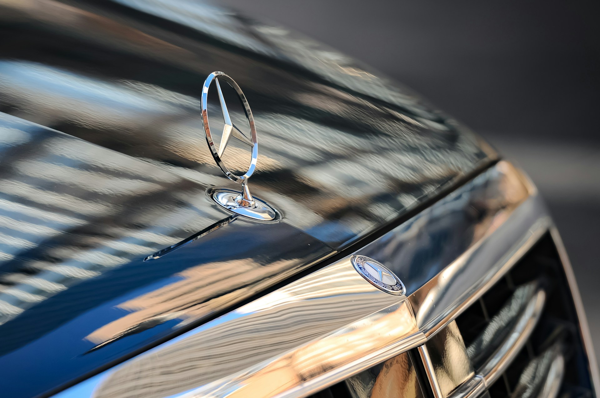 The History and Meaning Behind 10 Luxury Car Logos - Lettermine Studio